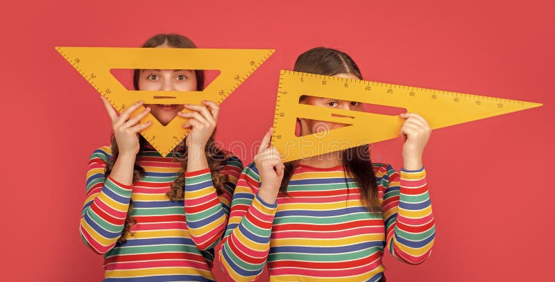 Happy School Students Hold Math Tool of Triangle Stock Photo - Image of ...
