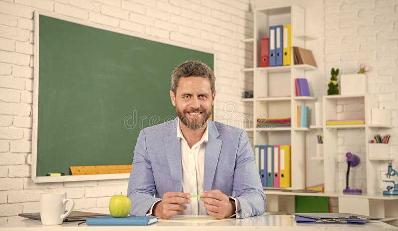 Happy School Teacher in Classroom at Blackboard Stock Image - Image of ...