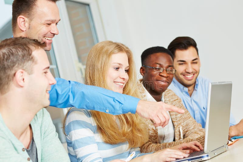 Teacher Pointing To Computer Stock Photo - Image of group, lecturer ...