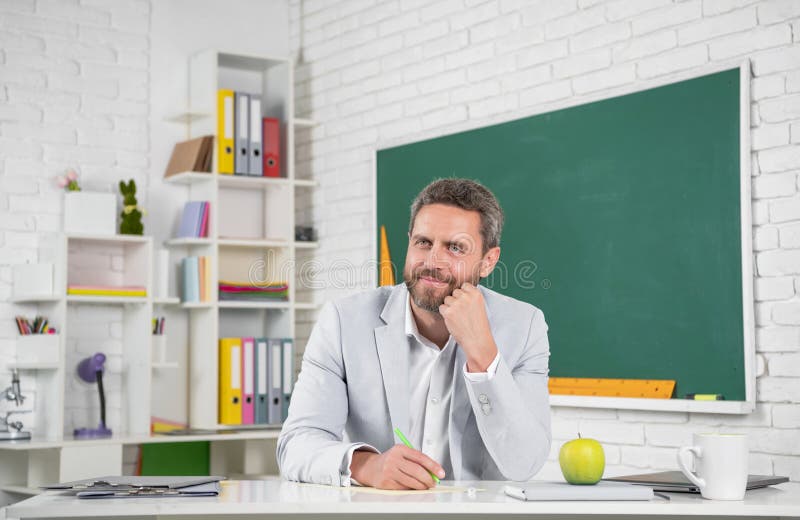 Happy School Tutor in Classroom at Blackboard Stock Image - Image of ...