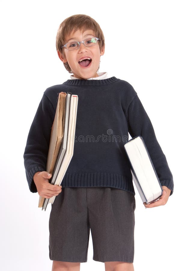 Happy schoolboy with books stock photo. Image of standing - 53943492