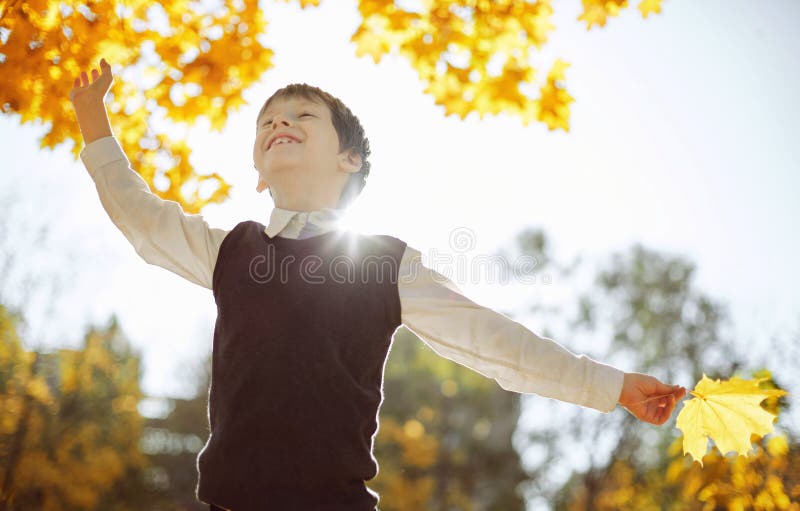 Schoolboy Laughing and Playing in the Autumn on the Nature Walk ...