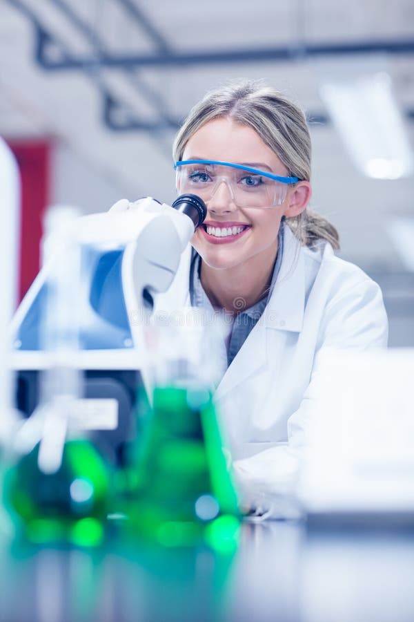 Happy Science Student Working with Microscope in the Lab Stock Photo ...