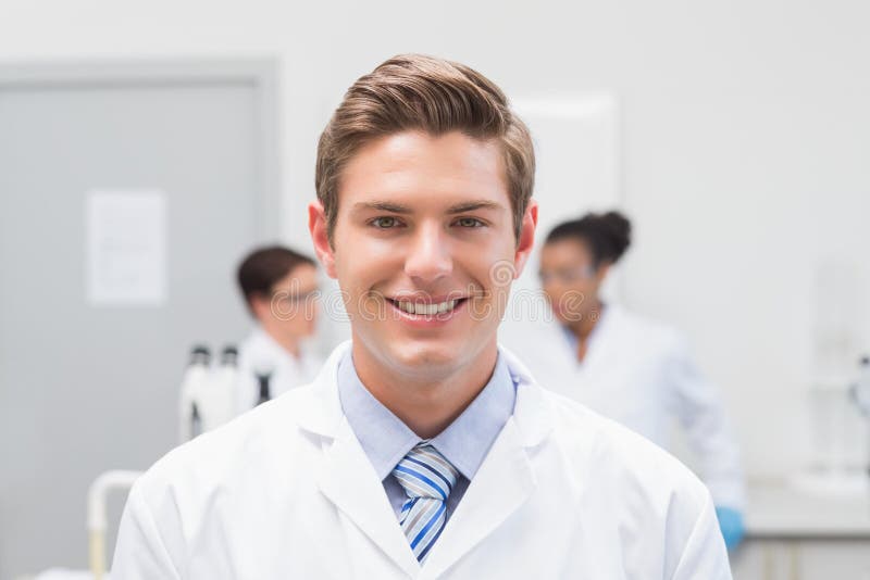Happy Scientist Smiling at Camera Stock Image - Image of colleagues ...