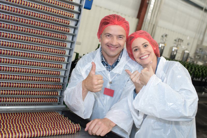 Happy Factory Workers Talking Stock Image - Image of equipment, safety ...