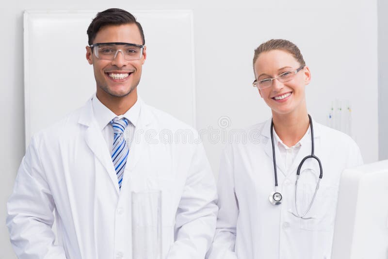 Happy Scientists Smiling at Camera Stock Image - Image of adult ...
