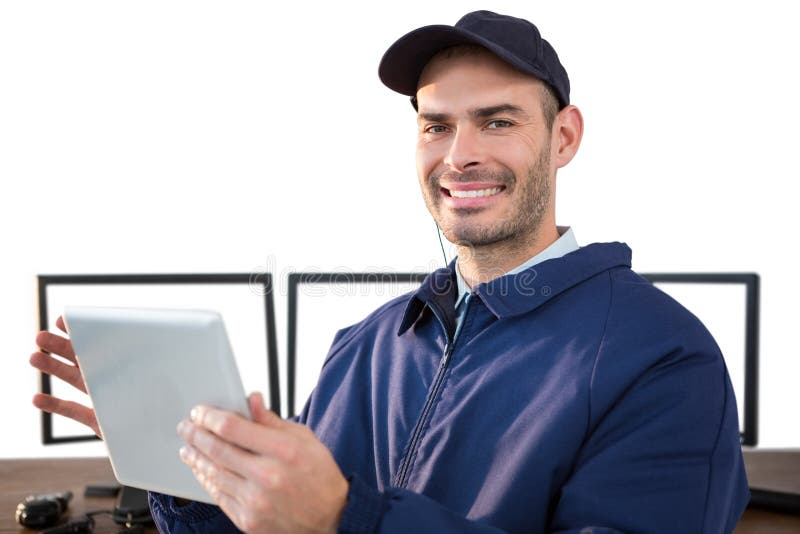 Happy Security Officer Using Digital Tablet at Desk Stock Image - Image ...