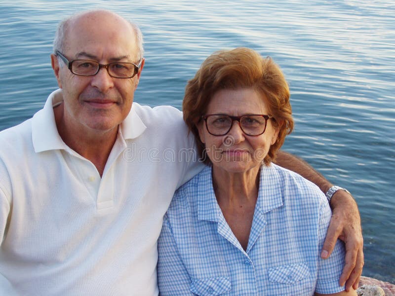 Happy Elderly Couple on Vacation Stock Image - Image of seniors, smile ...