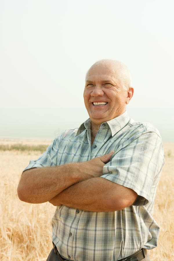 Happy senior farmer stock image. Image of grandfather - 16433759