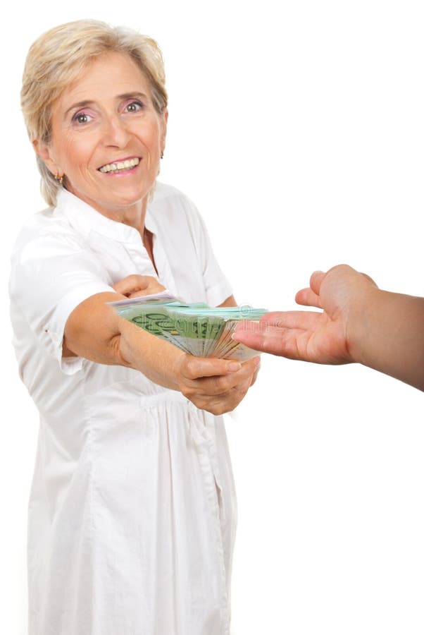 Happy senior giving money stock photo. Image of expression - 15573066