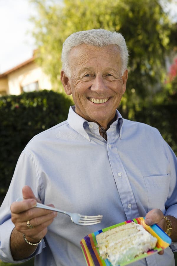 Happy Senior Man Eating Cake Stock Photo - Image of celebrating ...