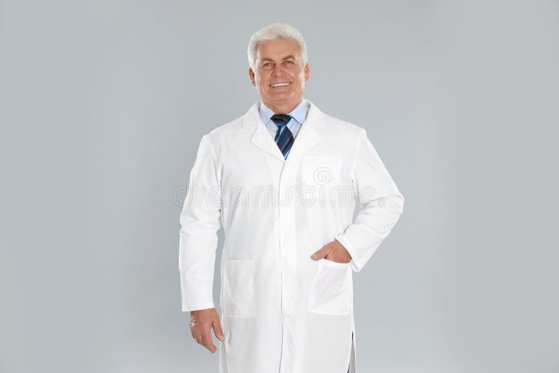 Happy Senior Man in Lab Coat on Grey Background Stock Photo - Image of ...