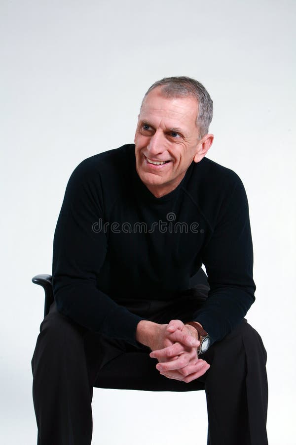 Happy senior man seated stock image. Image of attractive - 8539639