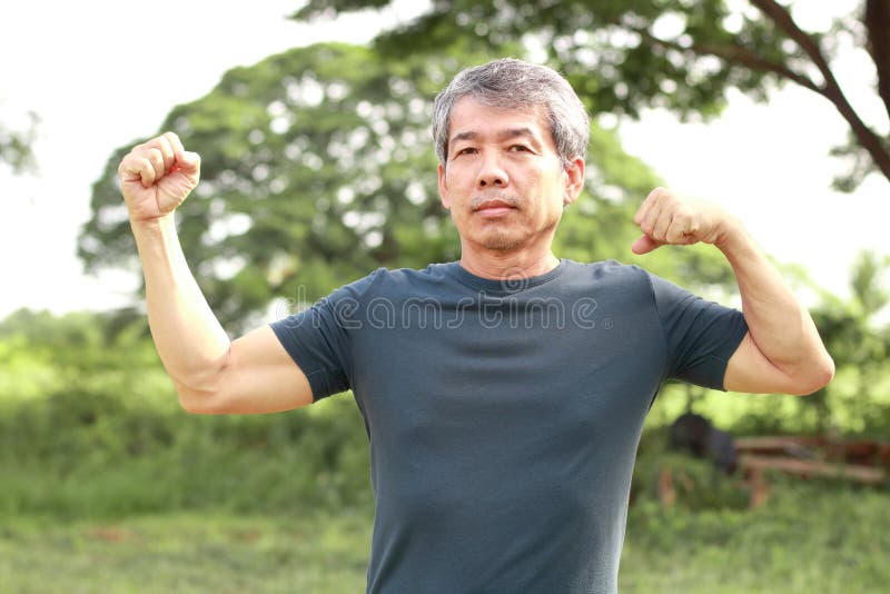 Happy Senior Man Show Still Strong Stock Photo - Image of park, male ...