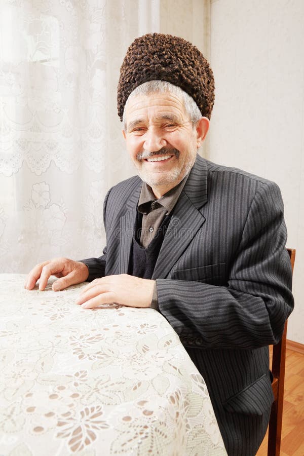 Happy Senior Man Sitting at Table Stock Image - Image of adult ...