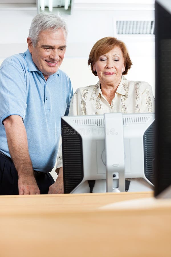 Happy Senior People Using Computer in Class Stock Photo - Image of ...