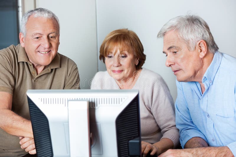 Happy Senior People Using Computer in Classroom Stock Image - Image of ...