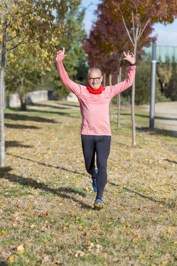Senior Runner Man Arms Up after Running Stock Image - Image of leisure ...