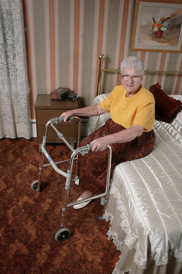 Elderly woman with walker stock photo. Image of aged, lane - 8962694