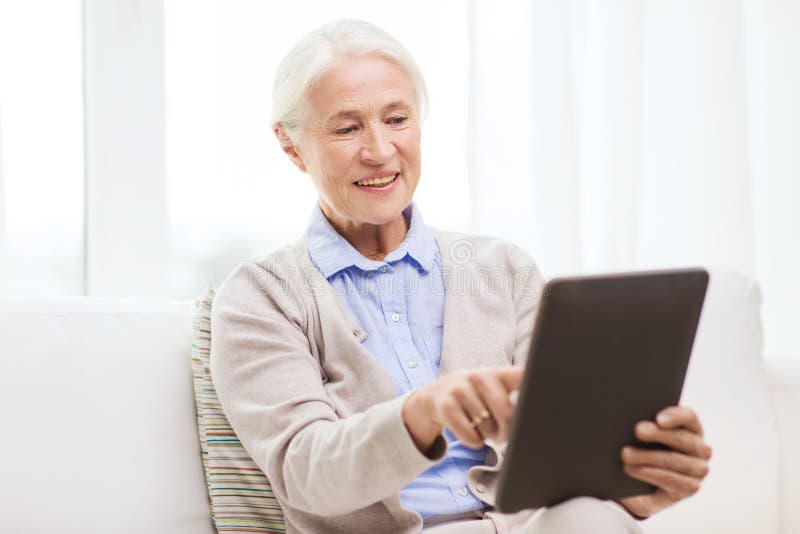 Happy Senior Woman with Tablet Pc at Home Stock Photo - Image of ...