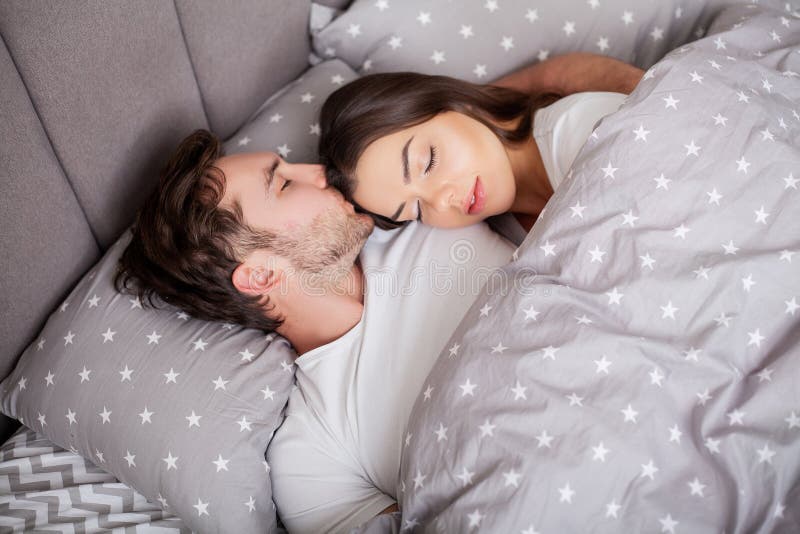 Happy Sensual Young Couple Lying in Bed Together. Stock Photo - Image ...