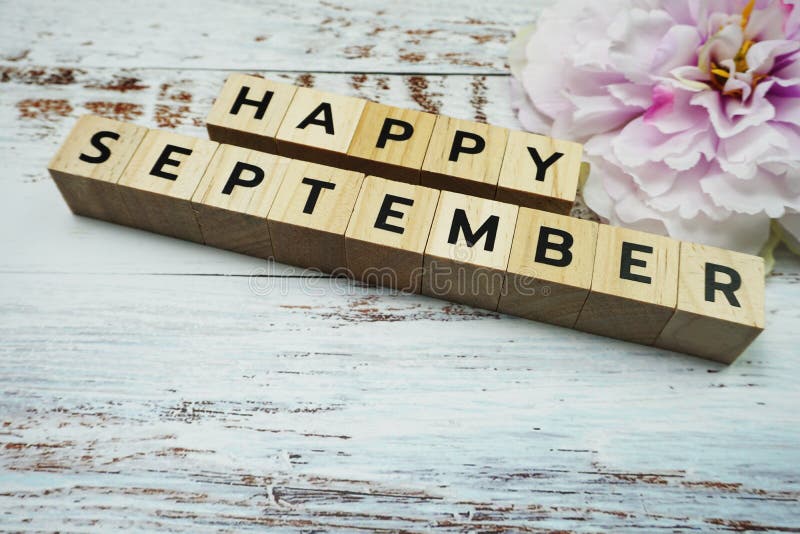 September Alphabet Letter with Maple Leaves Frame on Wooden Background ...