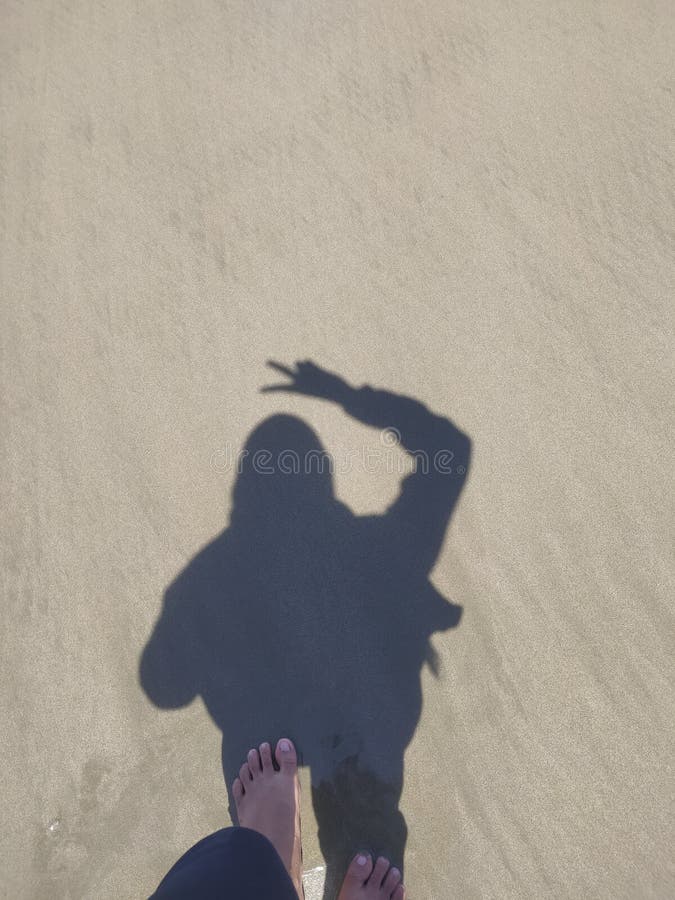 Happy shadow stock photo. Image of happy, shadow, beach - 208841056