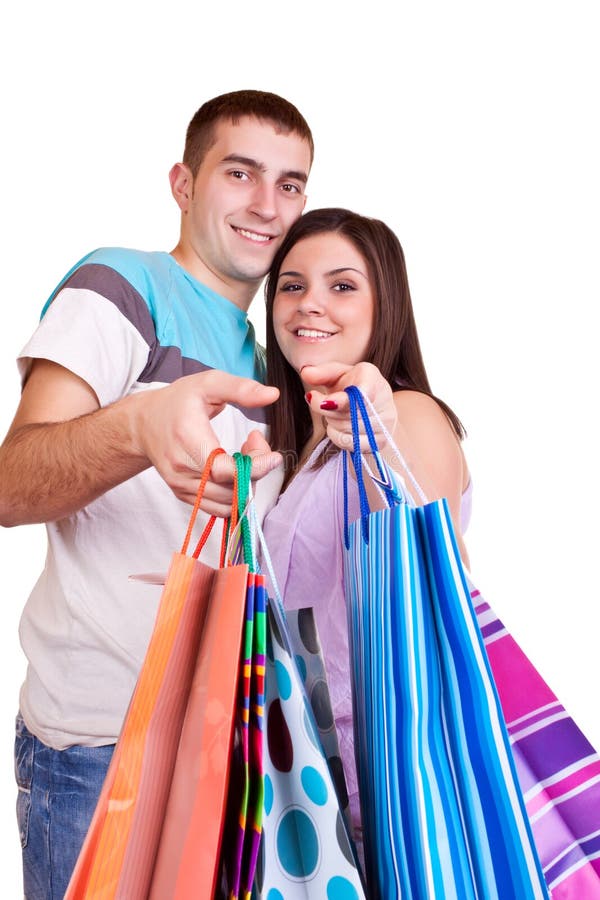 Happy shoper couple stock image. Image of color, colorful - 13077911