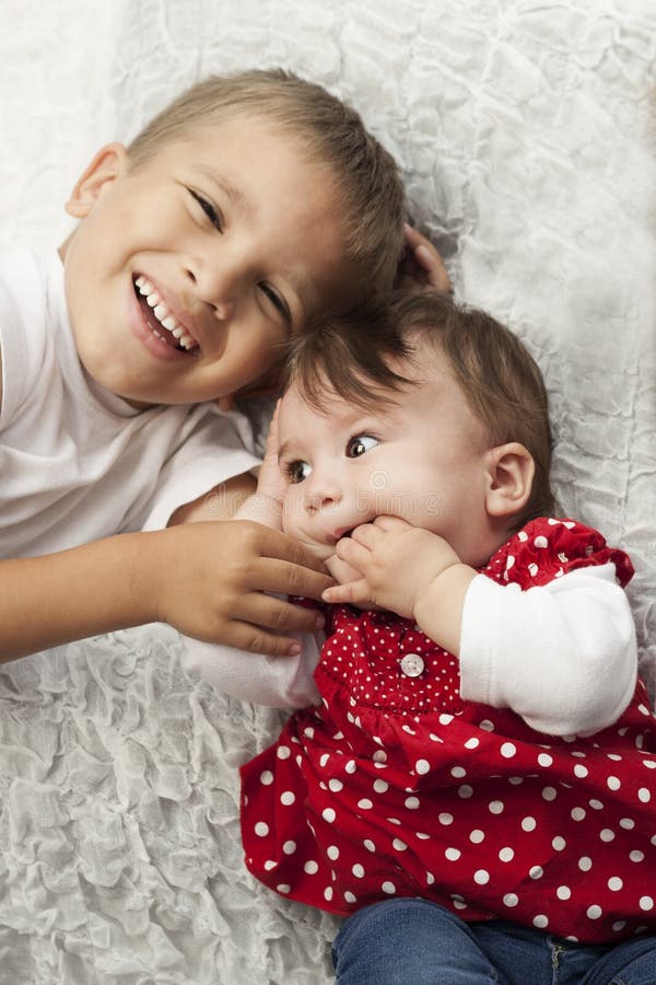 Happy siblings stock photo. Image of camera, body, carved - 45294546