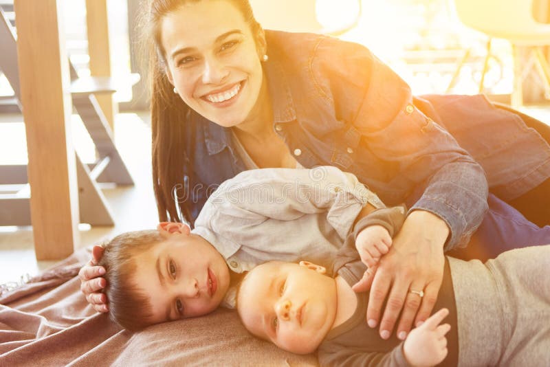 Happy Single Mother with Baby and Child Stock Photo - Image of life ...