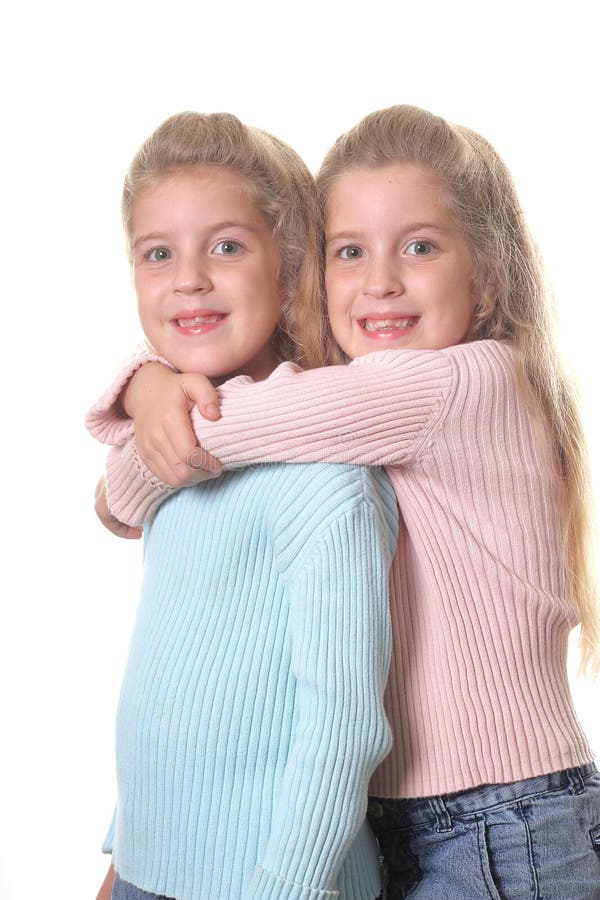 Happy Sisters Hug Vertical on White Stock Photo - Image of people ...