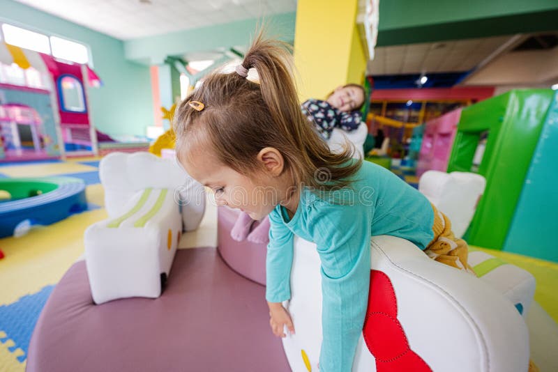 Happy Sisters Playing at Indoor Play Center Playground Stock Image ...