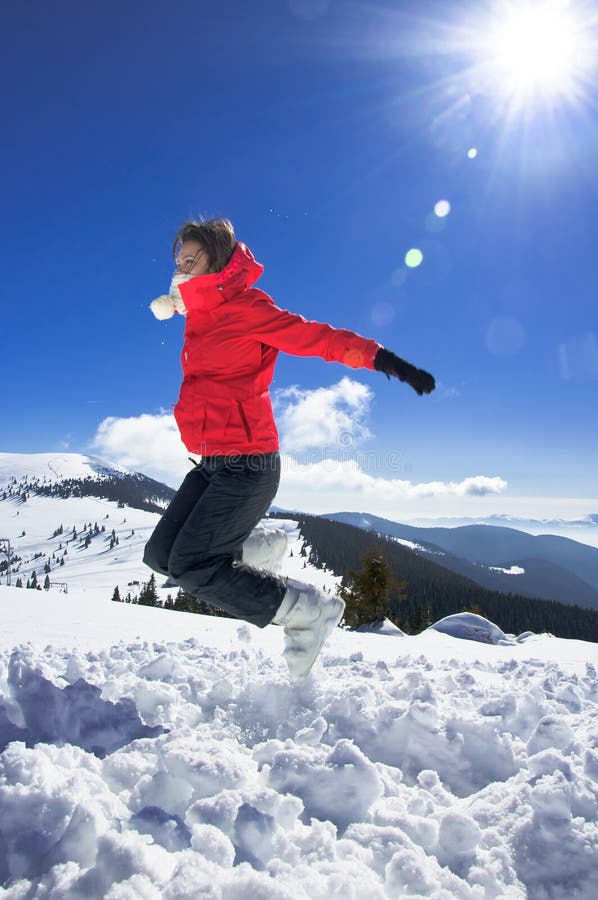 Happy Skiing Girl Jumping in Snow Stock Photo - Image of female ...