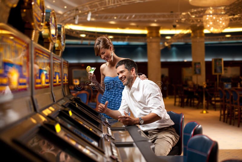 Couples Playing Arcade Games Stock Photo - Image of machine, happiness ...