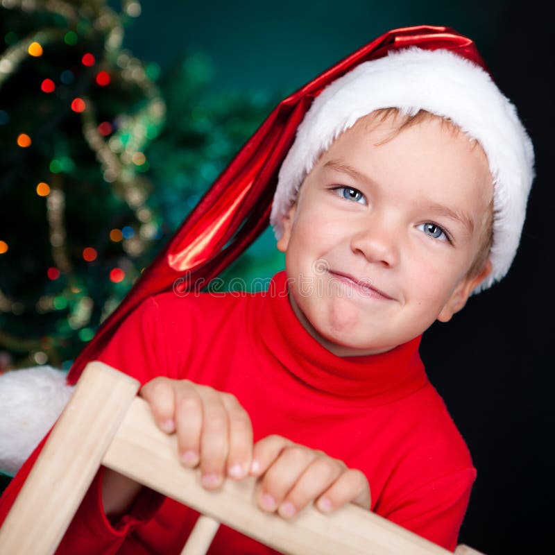 Happy Small Boy in Santa Hat Stock Image - Image of happiness, indoors ...