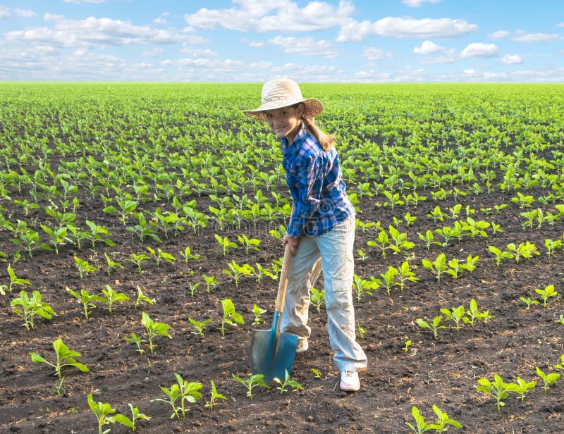 Happy Small Farmer with Spade in Spring Field Stock Photo - Image of ...