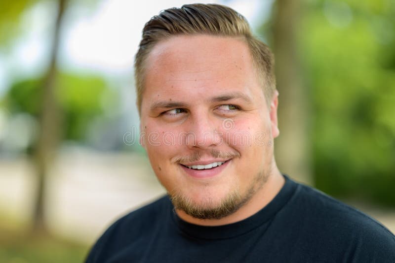 Happy Smile Young Man Looking Aside with a Knowing Expression Stock ...