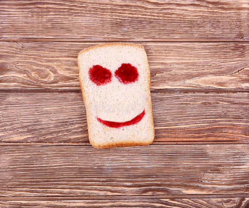 Happy Smiley Face Made of Ketchup on a Slice of Bread Stock Photo ...