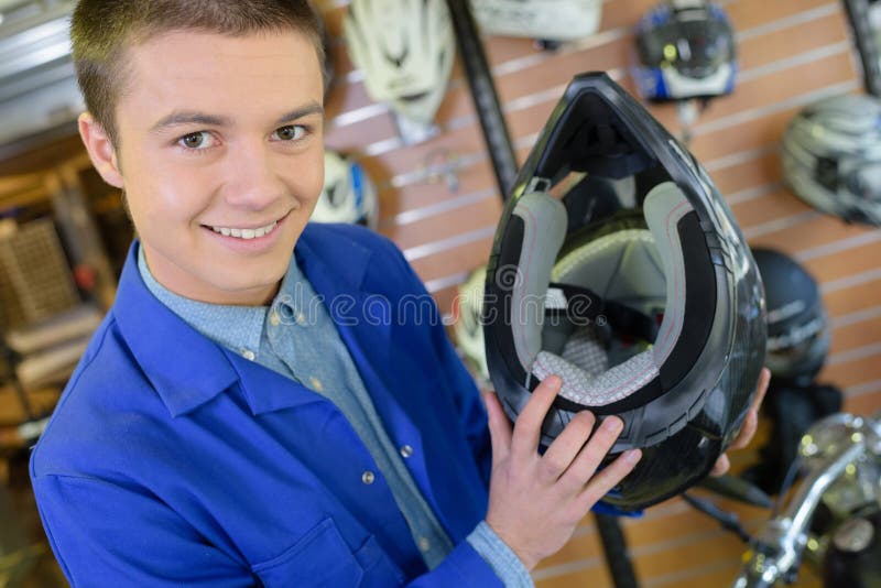 Happy Smiling Boy Choosing Protective Helmet in Store Stock Photo ...