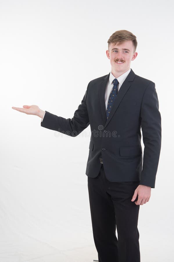 Happy Smiling Young Man Presenting and Showing Your Text or Prod Stock ... Happy Smiling Young Man Presenting and Showing Your Text or Prod Stock ...
