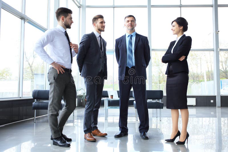 Happy Smiling Business Team in Office Stock Photo - Image of staff ...