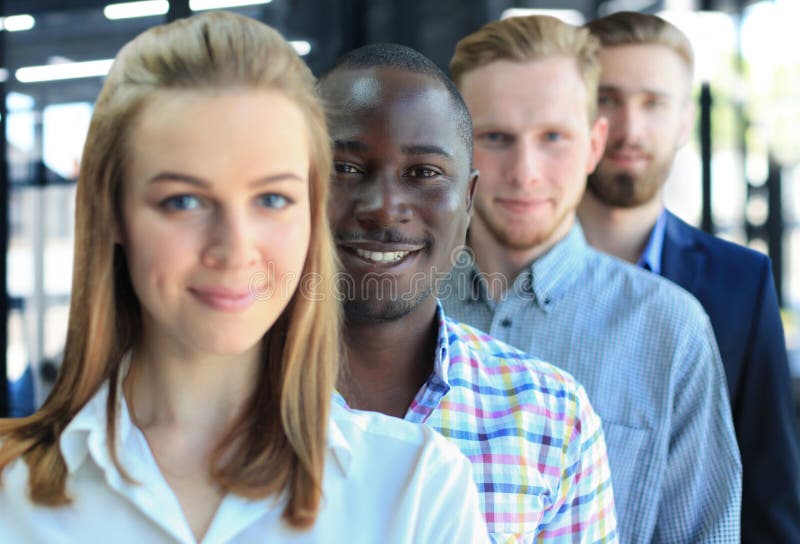 Happy Smiling Business Team Standing in a Row at Office Stock Image ...