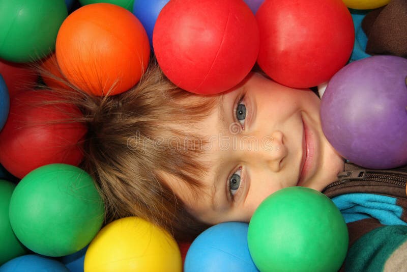 Happy Smiling Child Playing Stock Image - Image of playgroup, balls ...