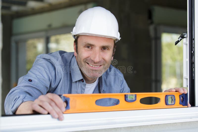 Happy Smiling Constructor Holding Tool Stock Photo - Image of tool ...