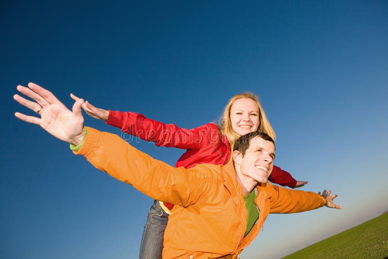 Happy Smiling Couple Fly in Sky Stock Photo - Image of couple, holiday ...