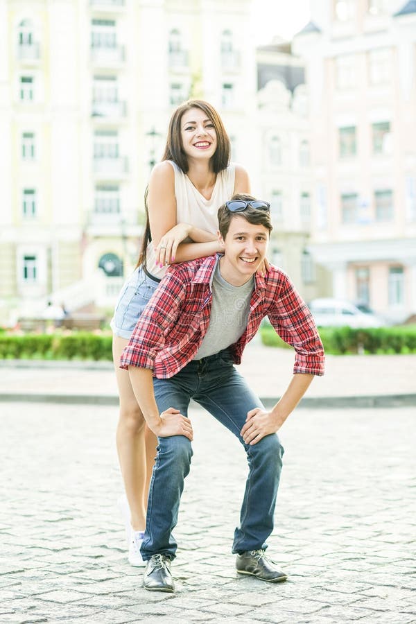 Happy Smiling Couple Having Fun in the Street on Summertime Stock Photo ...