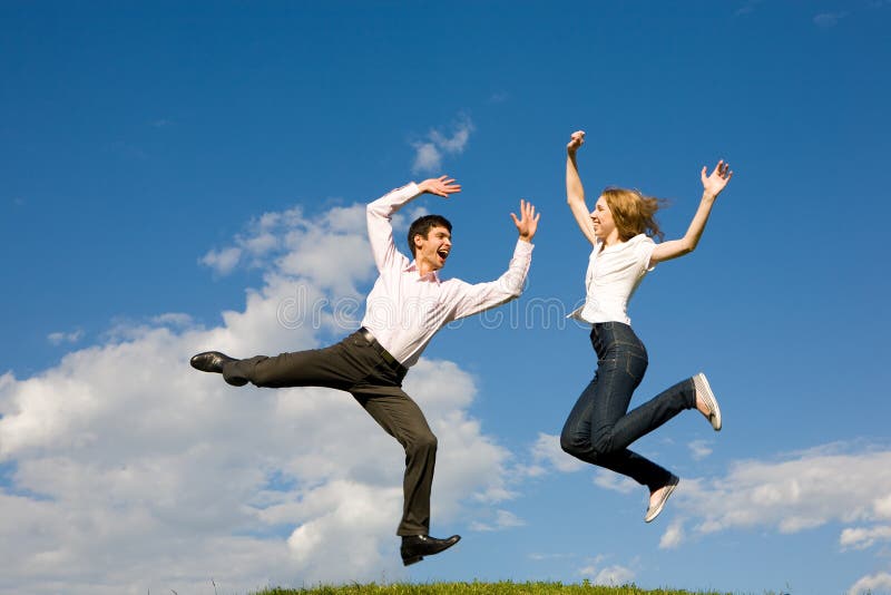 Happy Smiling Couple Jumping in Blue Sky Stock Photo - Image of field ...