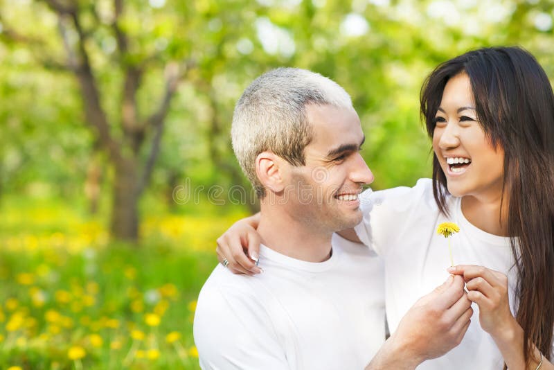 Happy Smiling Couple in Love in Spring Garden Stock Photo - Image of ...