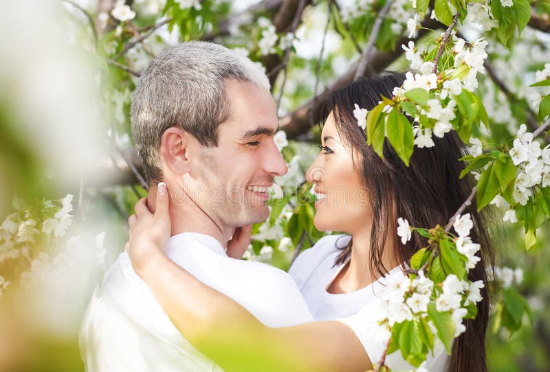 Happy Smiling Couple in Love in Spring Garden Stock Image - Image of ...