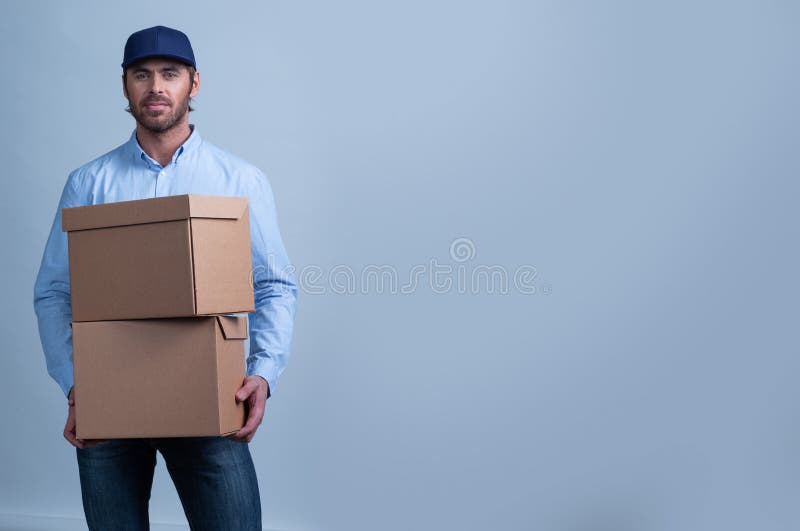 Delivery man with boxes stock image. Image of courier - 166765667